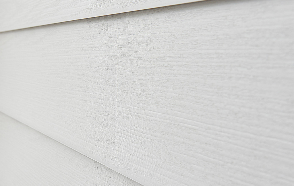 Niece Lumber takes on Wolf Portrait Siding in a big way - Niece Lumber